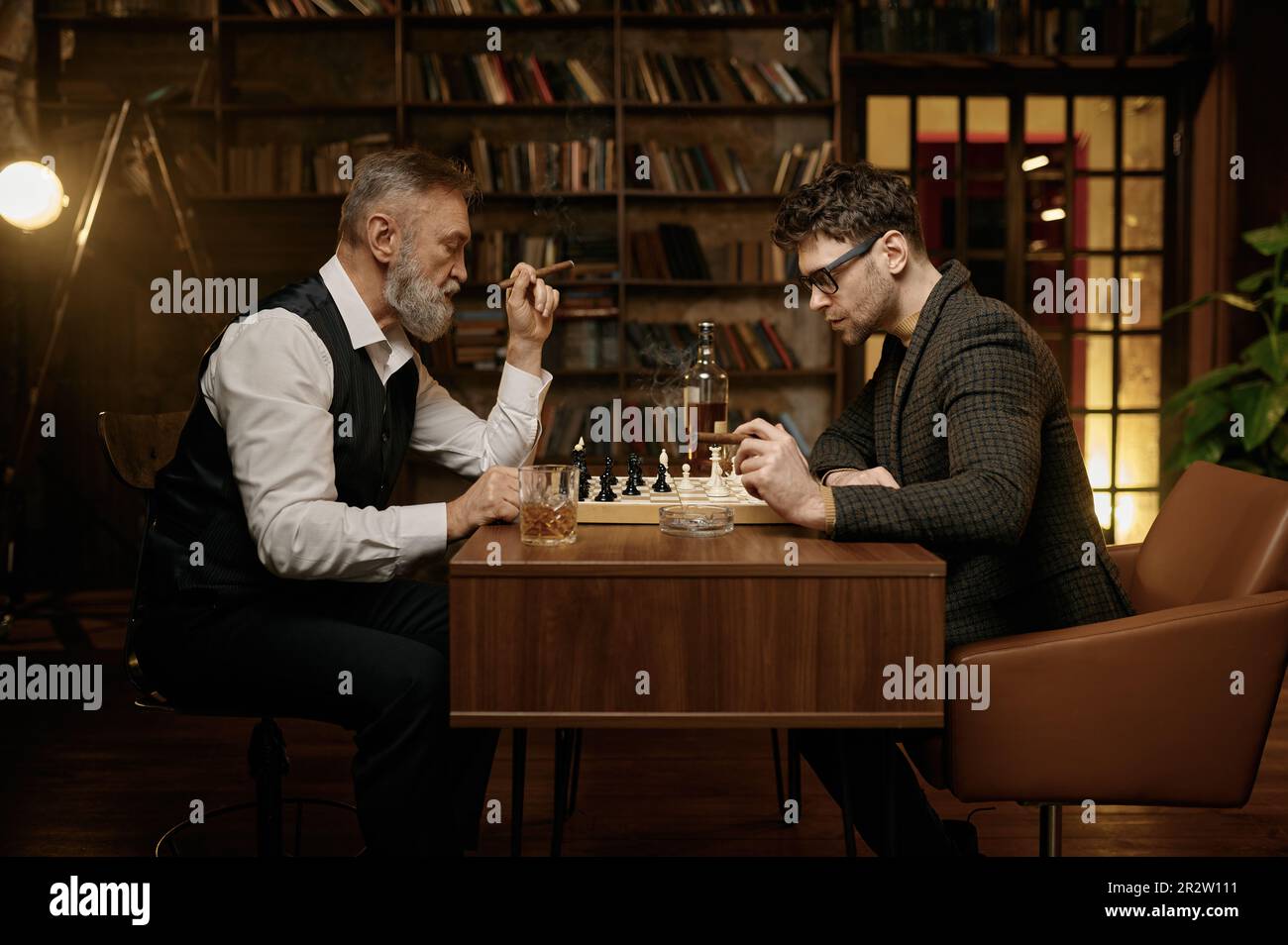 Family of intelligent people playing chess, smoking cigars and drinking ...