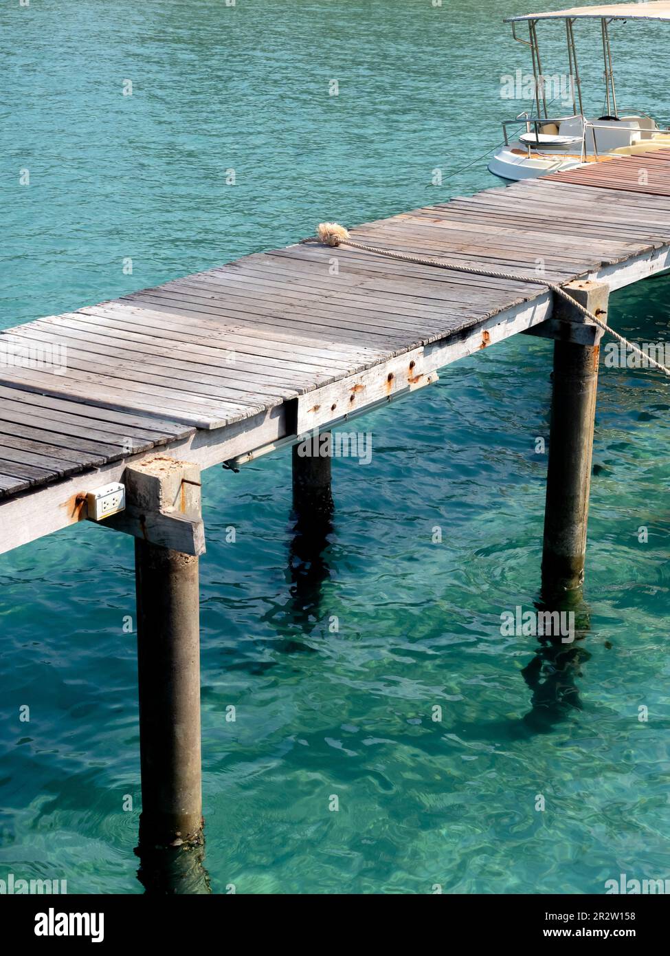 View of old rustic wooden plank bridge, pathway of pier or local port ...