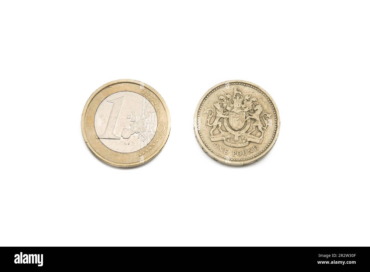 One Euro and Old One Pound Coins isolated on white background Stock ...