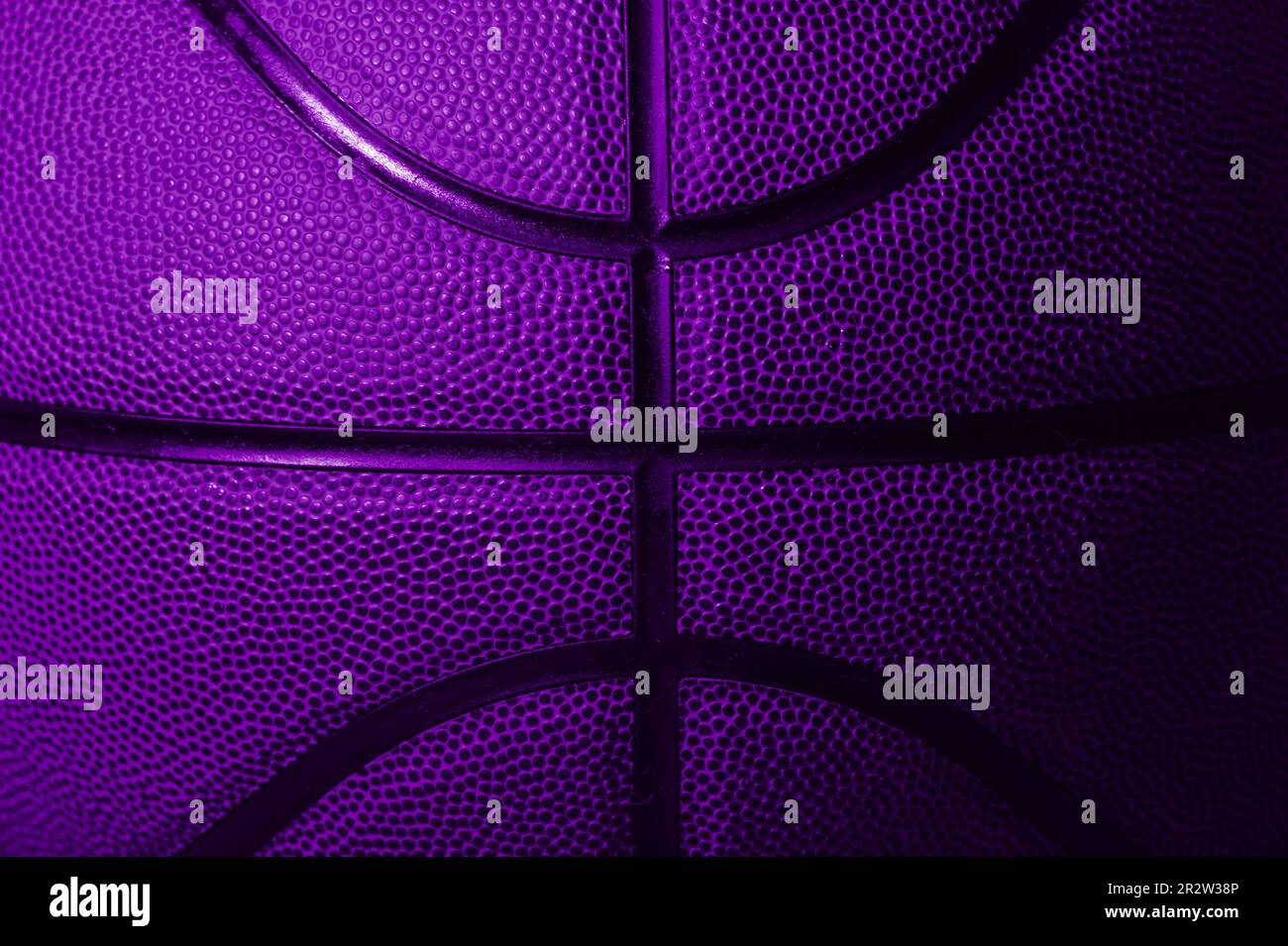 Closeup detail of purple basketball ball texture background. Horizontal ...