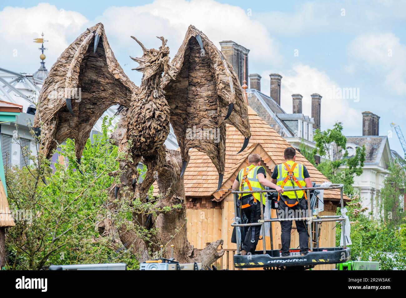 London, UK. 21st May, 2023. A giant dragon sculpture made of driftwood ...