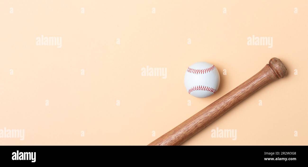 Baseball bat and ball on beige background. Horizontal sport theme ...