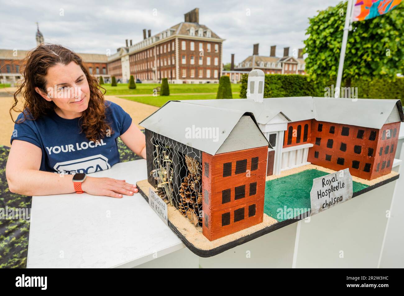 London, UK. 21st May, 2023. An RSPCA staff member shows off the ‘Royal ...