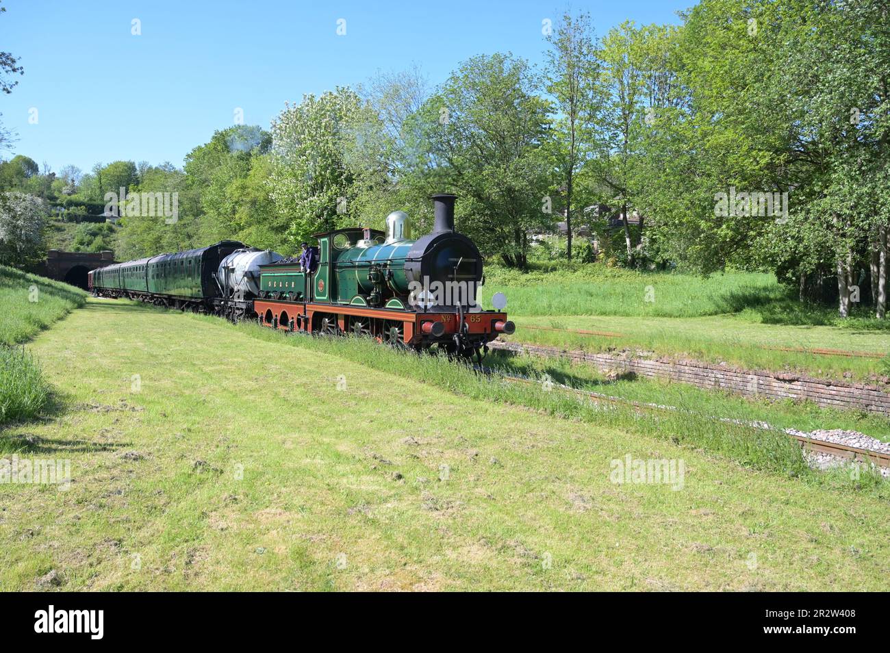 No 65 pulling a passenger train on the Bluebell railway Stock Photo - Alamy