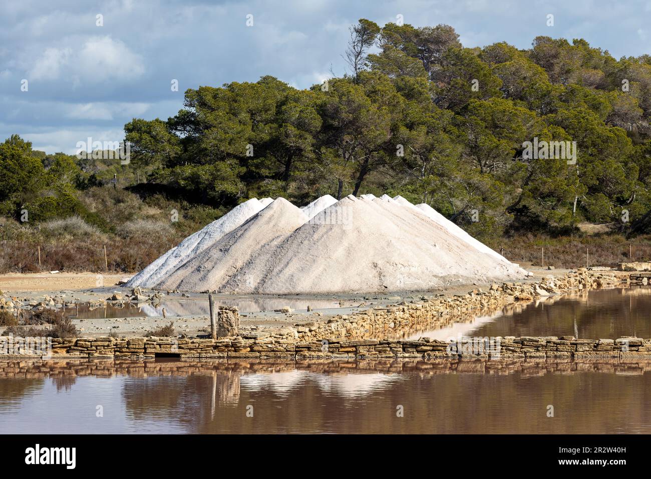 Salinas de S'Avall, salt evaporation pond with salt piles in Colonia de ...