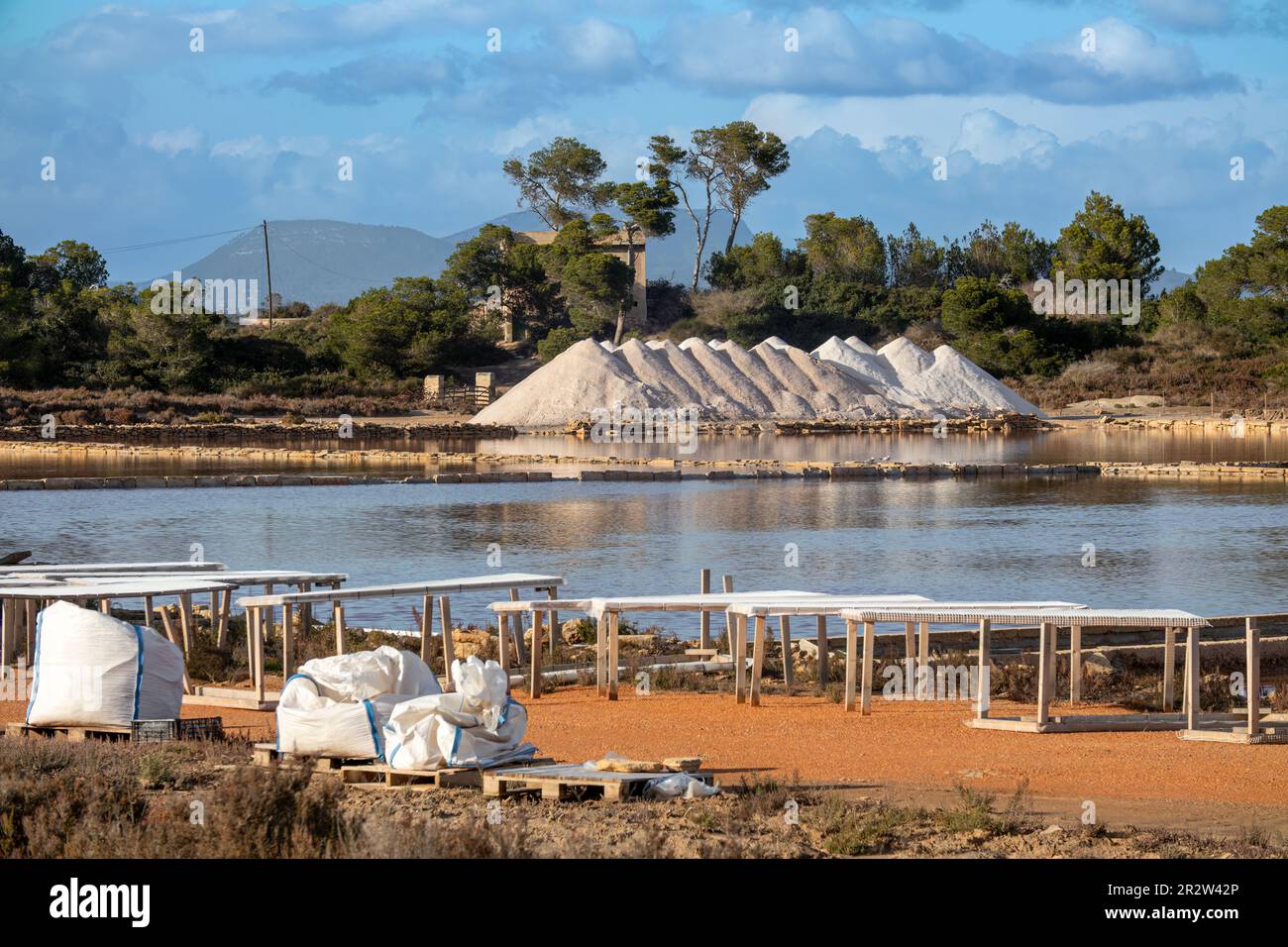 Salinas de S'Avall, salt evaporation pond with salt piles in Colonia de ...