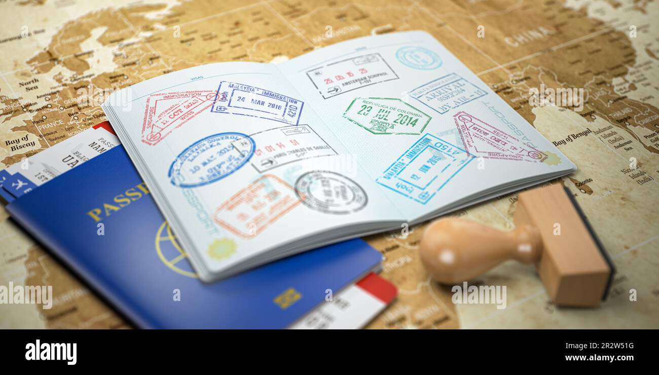 Opened passport with visa stamps with airline boarding pass tickets on ...
