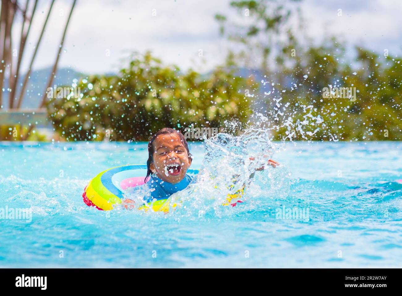 Hispanic kid water splash hi-res stock photography and images - Alamy