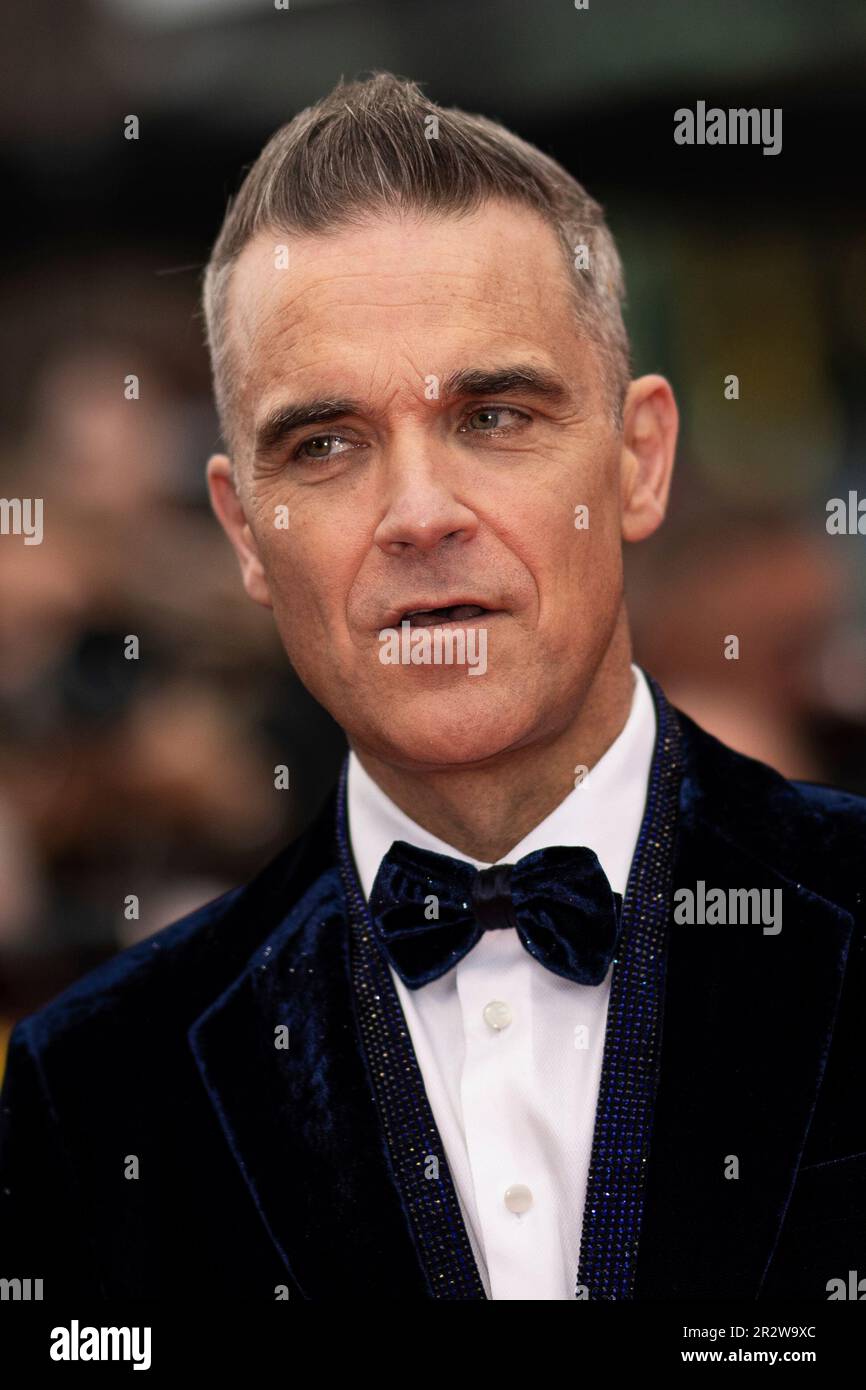 Robbie Williams poses for photographers upon arrival at the premiere of ...