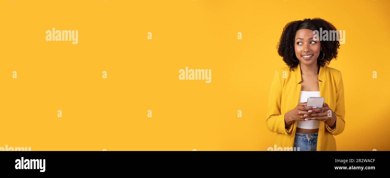 New application advertisement concept. Happy black woman using mobile ...