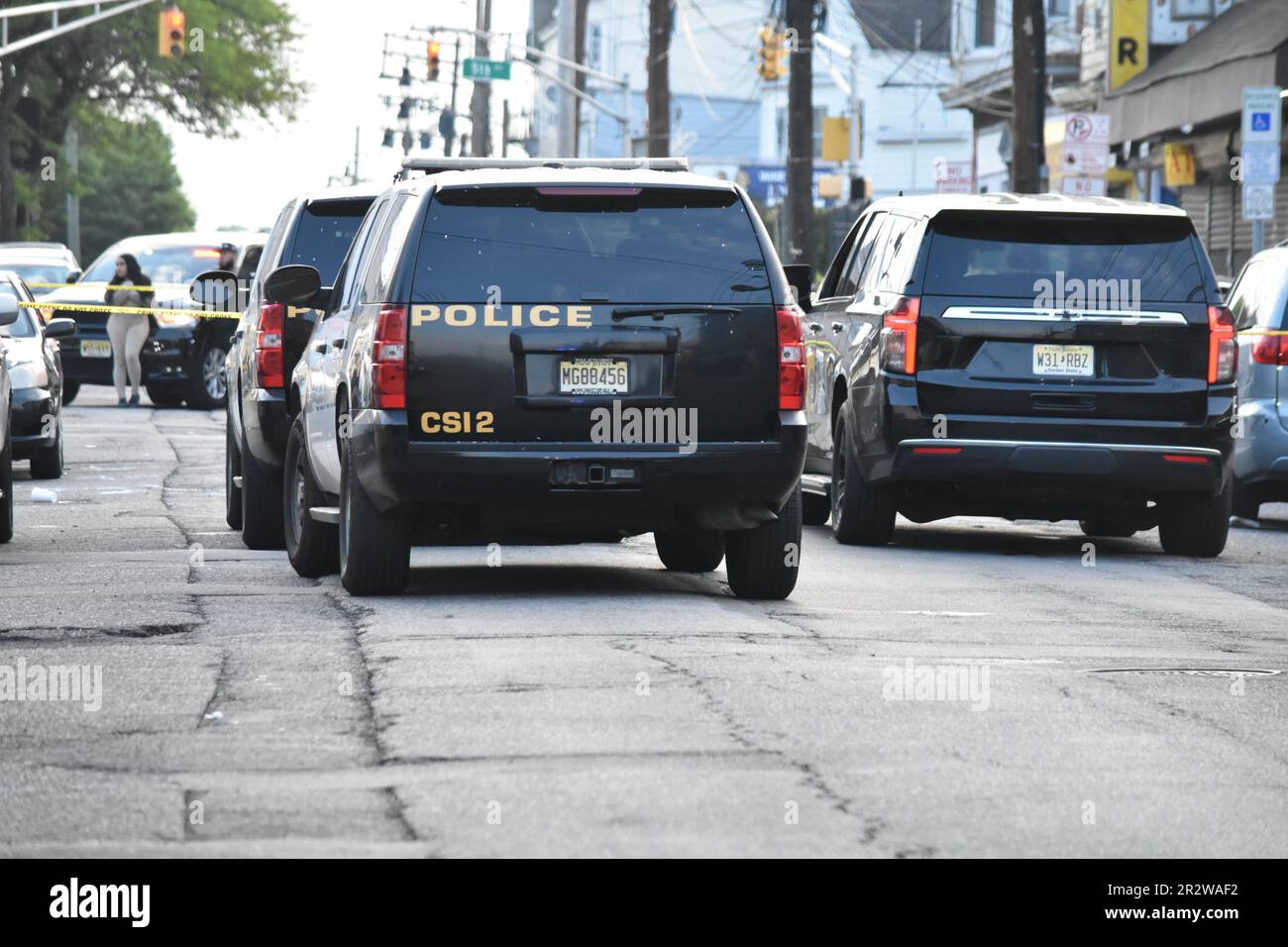 Crime scene tape blocks the area to pedestrians and vehicles where the ...