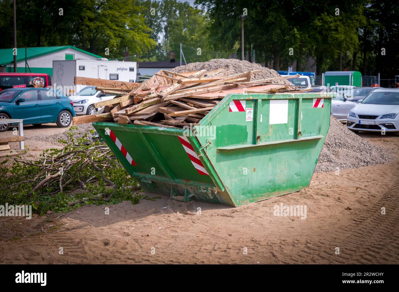 many wood waste is collected on a construction site in a green waste ...