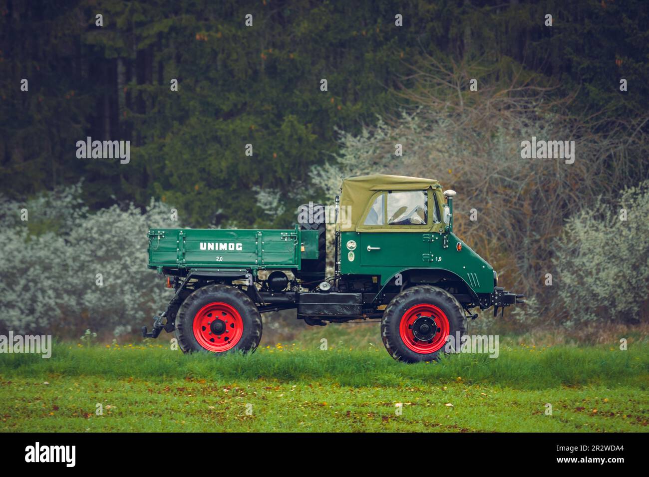 Unimog german oldtimer vintage 4x4 off-road truck on a country road on ...