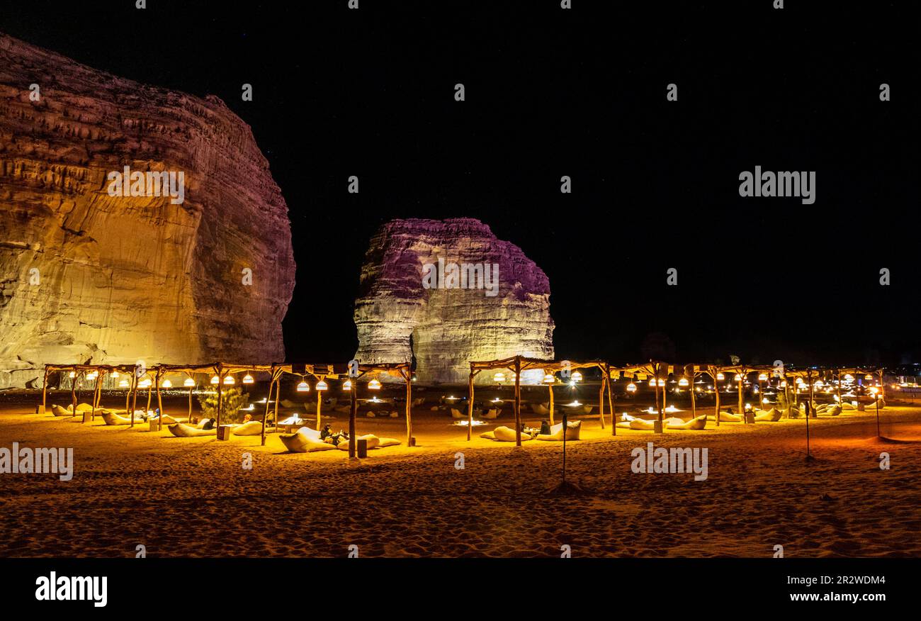 Illuminated outdoor lounge in front of elephant rock erosion monolith ...