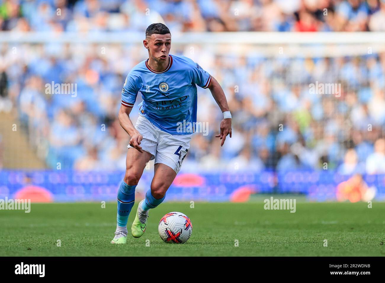 Phil Foden #47 of Manchester City with the ball during the Premier ...