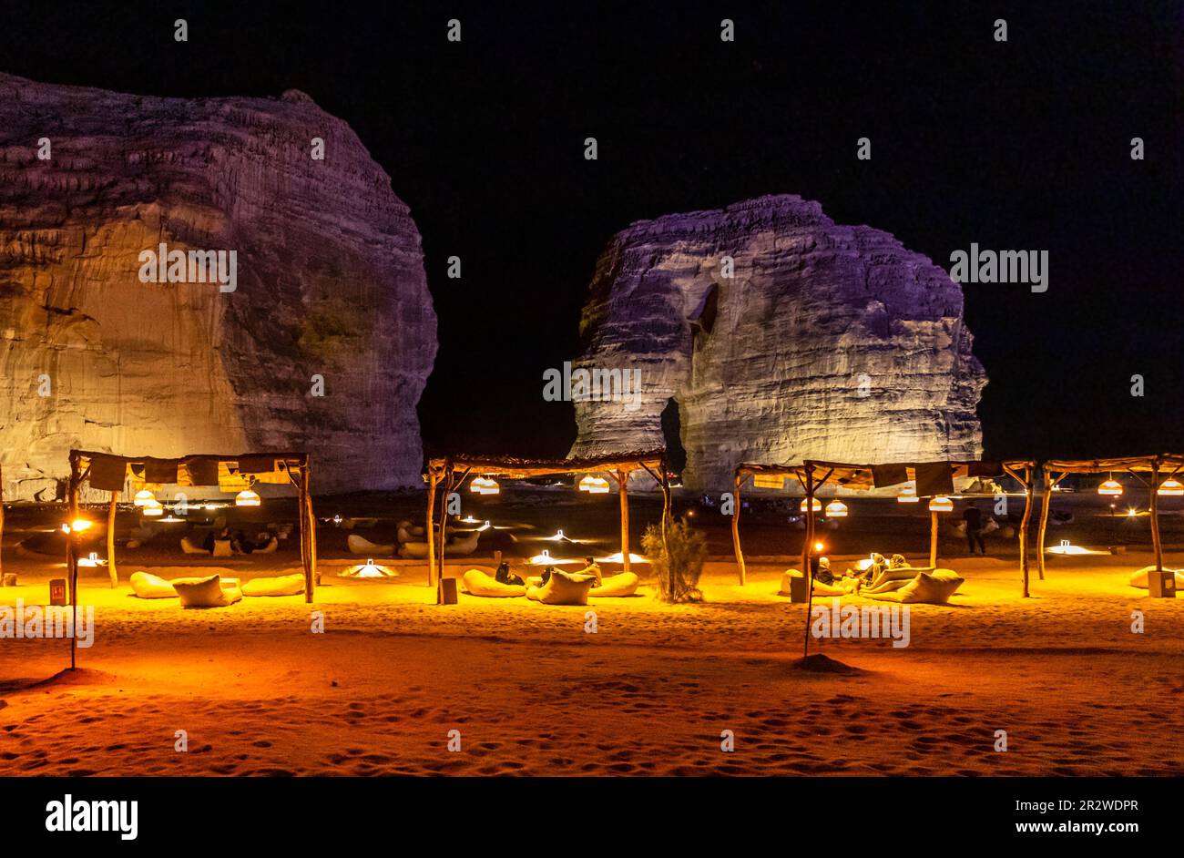 Illuminated outdoor lounge in front of elephant rock erosion monolith ...