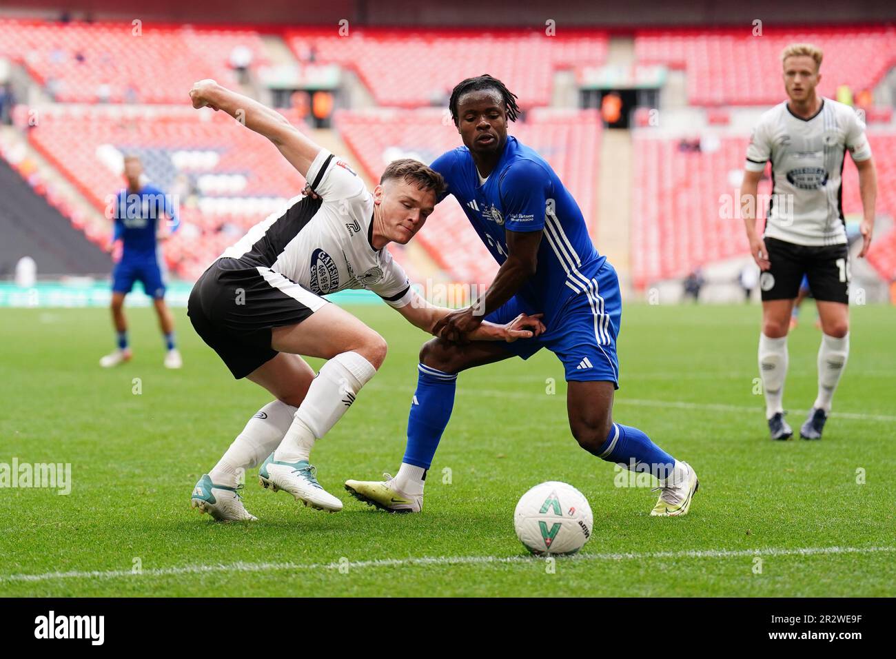 Gateshead’s Owen Bailey (left) and FC Halifax Town’s Millenic Alli ...