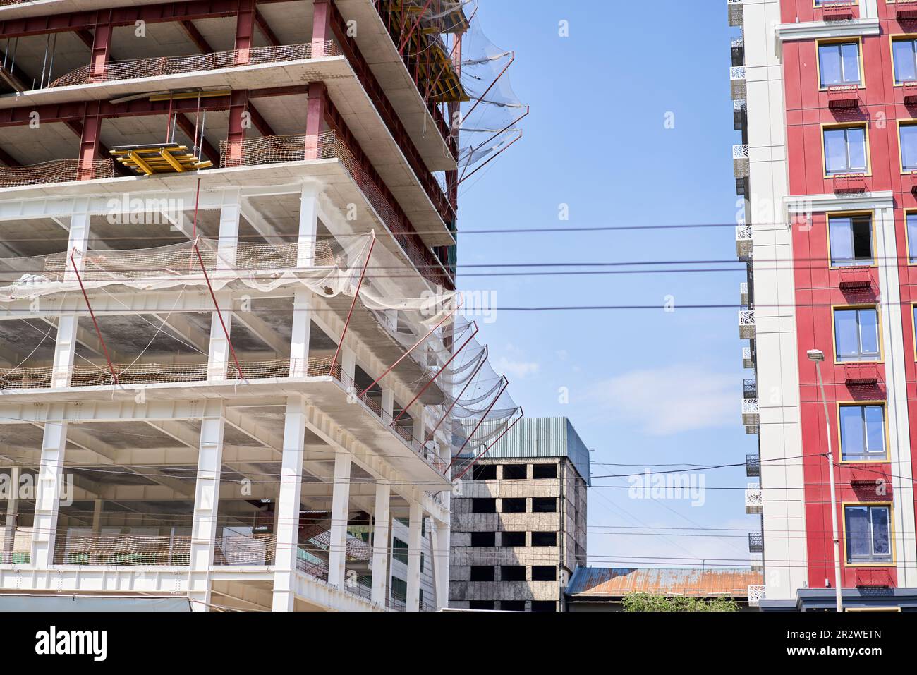 View of a large construction site with buildings under construction and ...