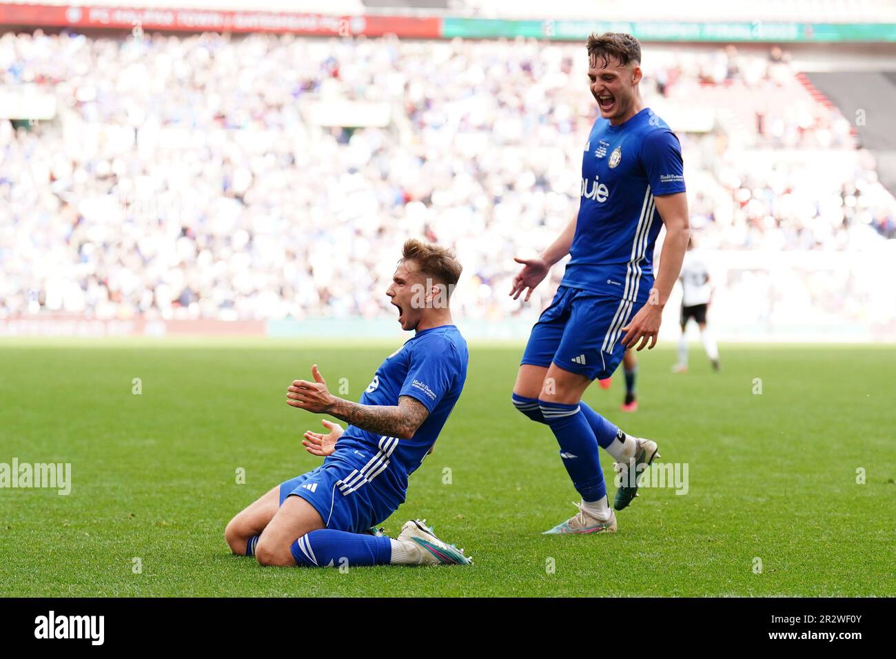 FC Halifax Town’s Jamie Cooke (left) celebrates after scoring their ...