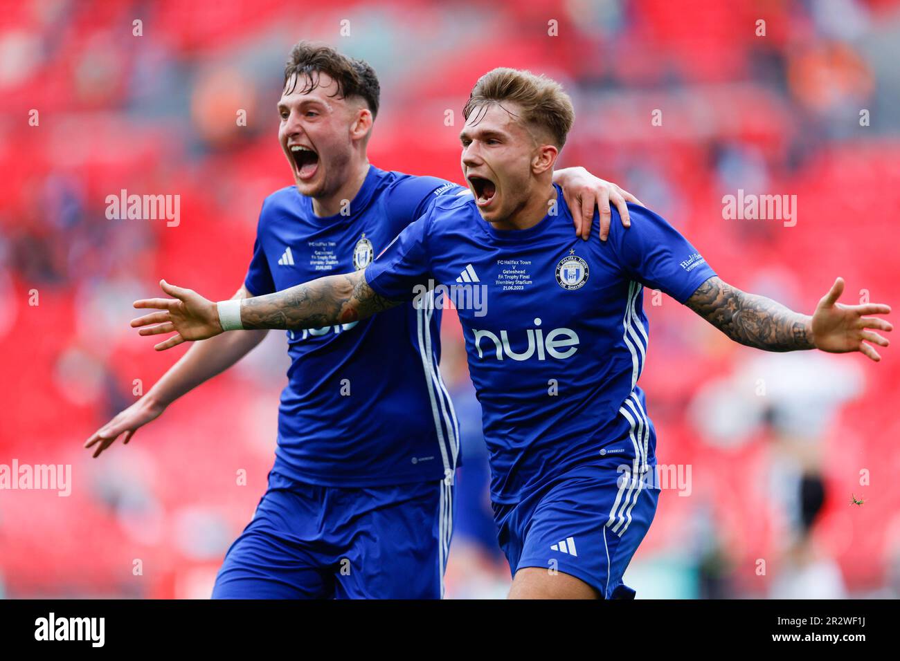 London, UK. 21st May, 2023. Jamie Cooke (19 Halifax Town) celebrates ...