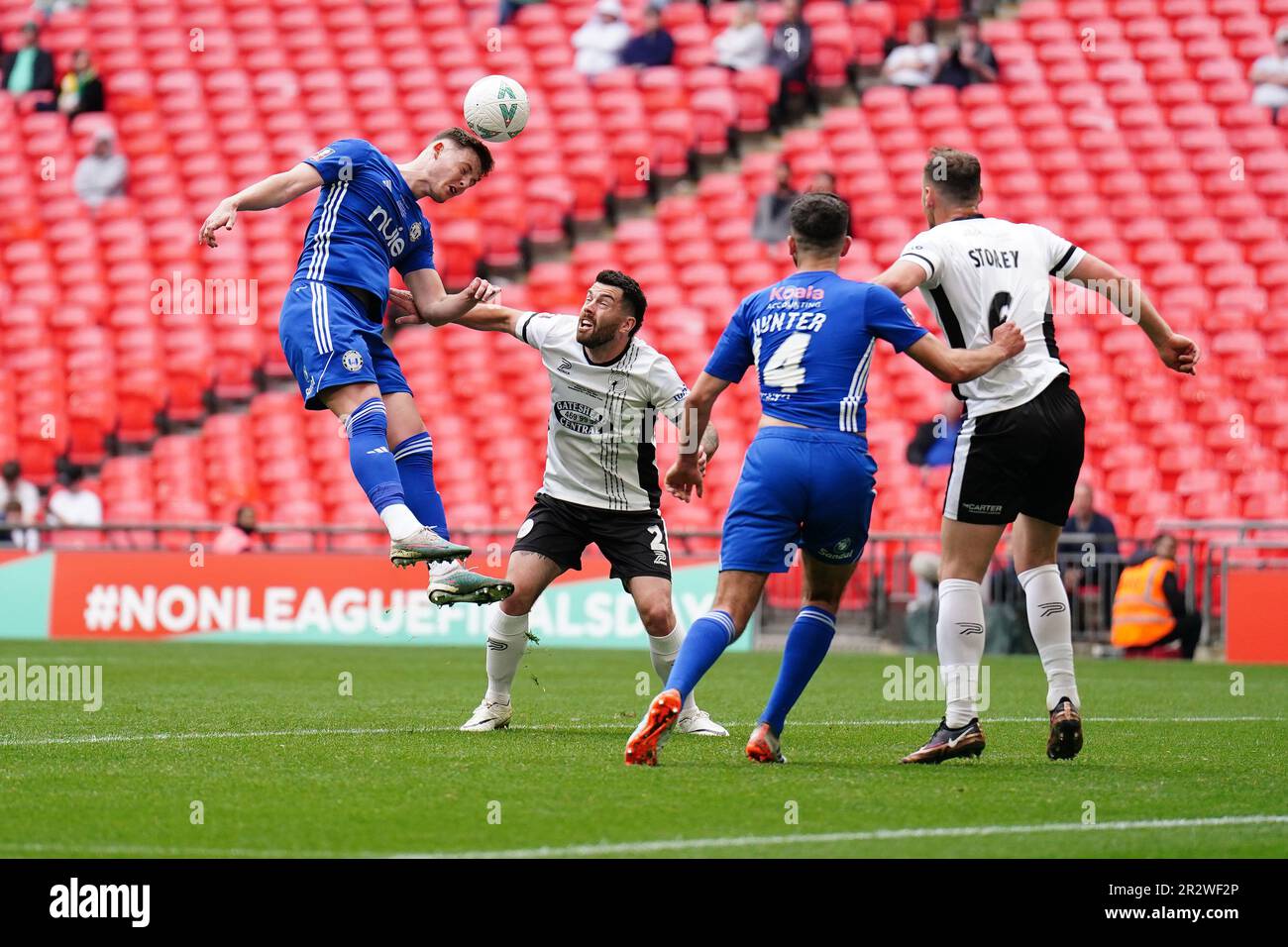 FC Halifax Town’s Jamie Cooke (left) heads towards goal during the ...