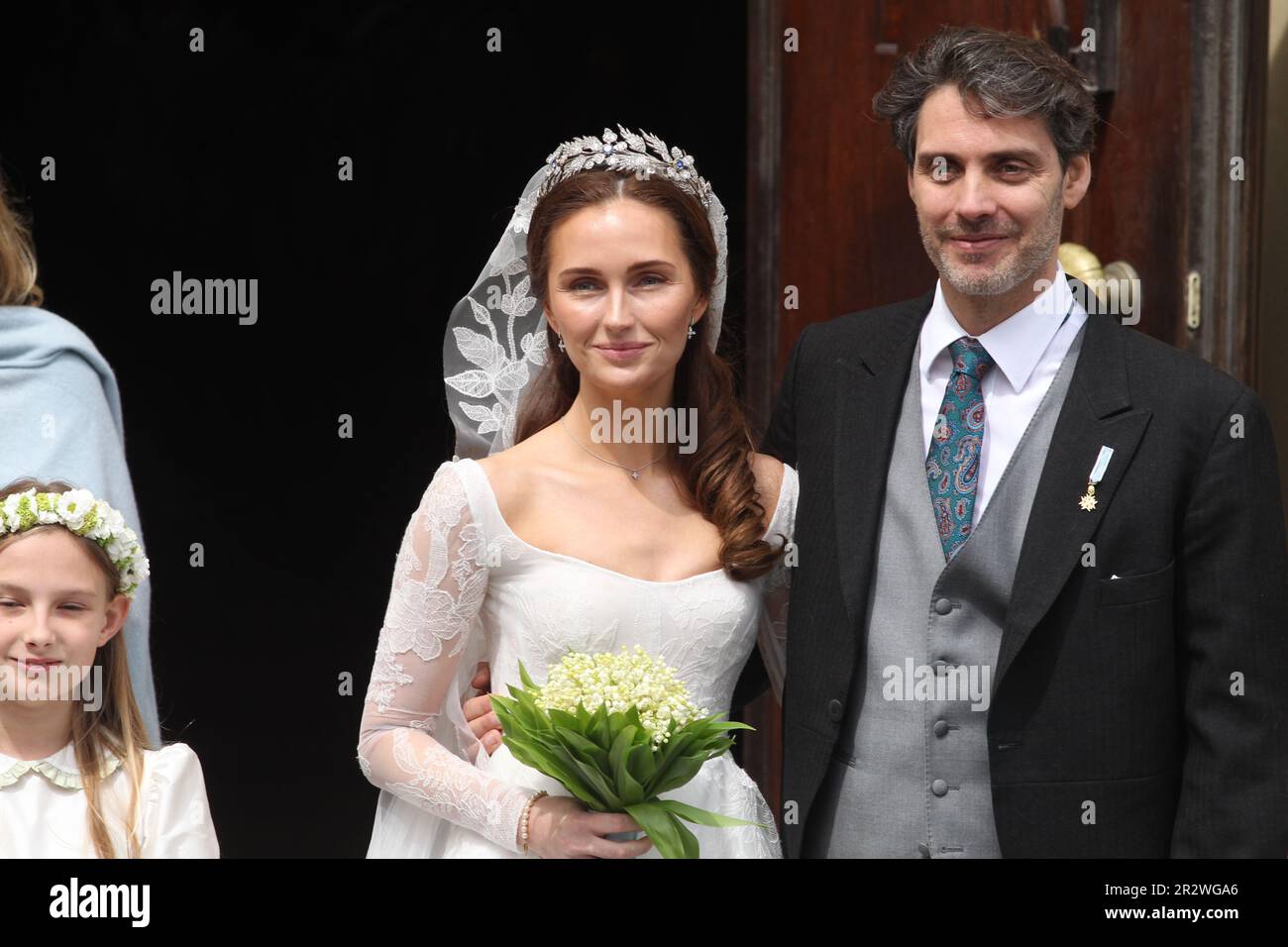 MUNICH, Germany - 20. MAY 2023: the bride and the groom leave the ...