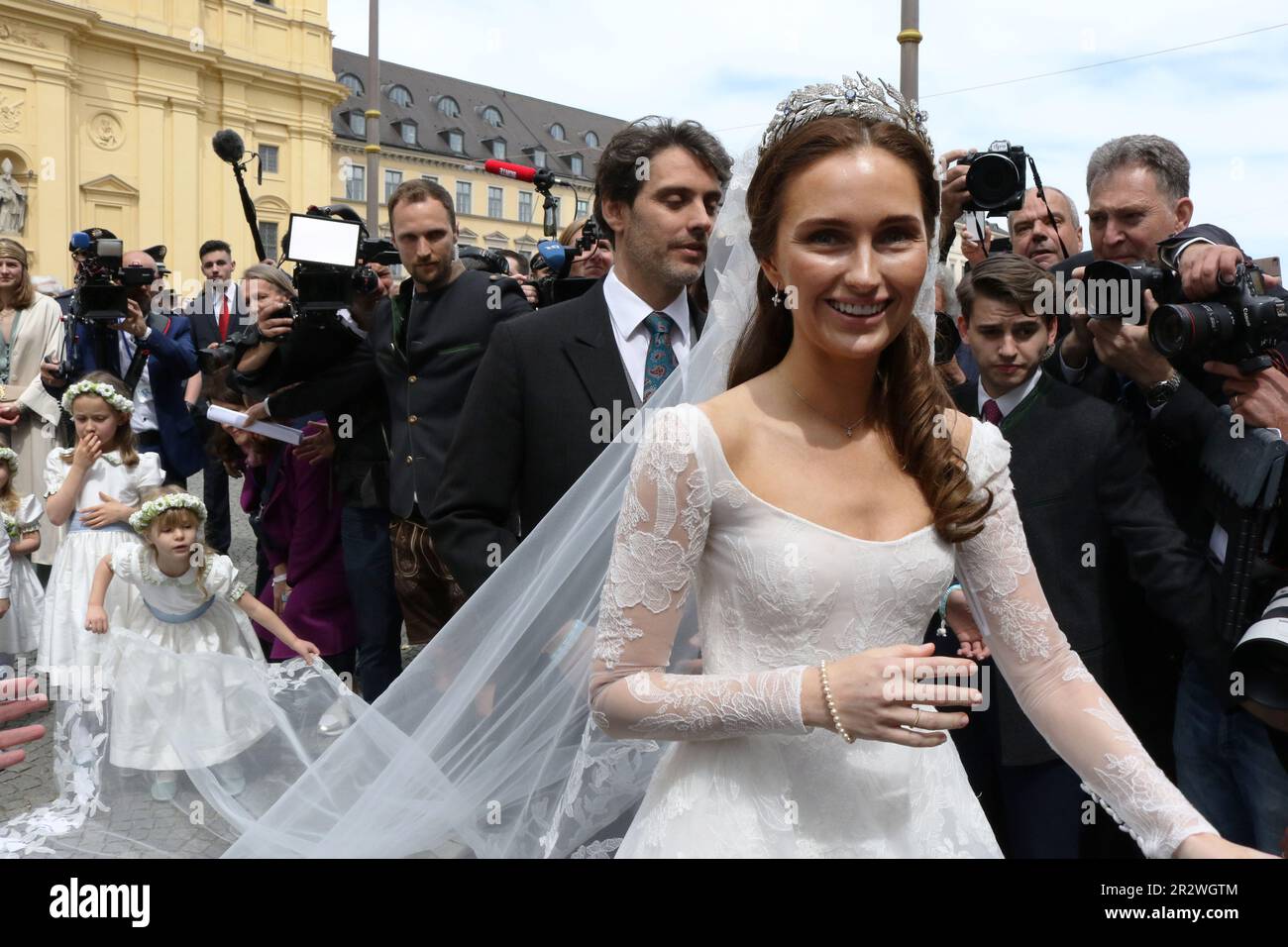 MUNICH, Germany - 20. MAY 2023: the bride and groom leave the wedding ...