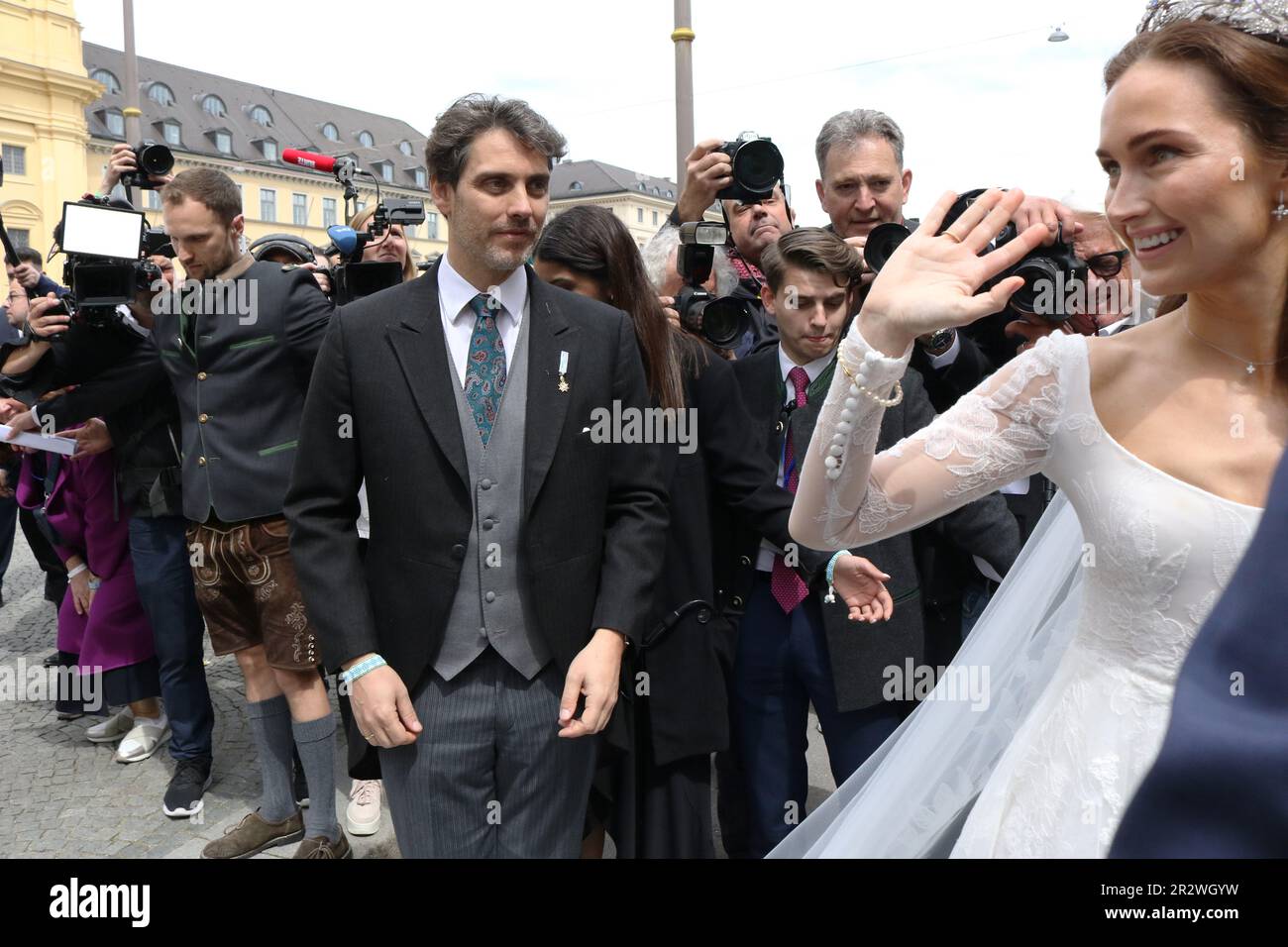 MUNICH, Germany - 20. MAY 2023: the bride and groom leave the wedding ...