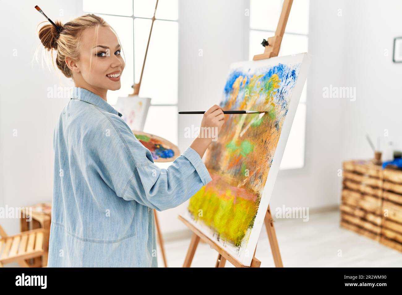 Young caucasian woman artist smiling confident drawing at art studio ...