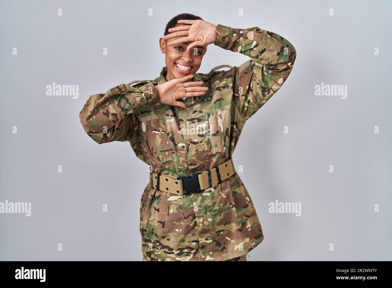 Beautiful african american woman wearing camouflage army uniform ...