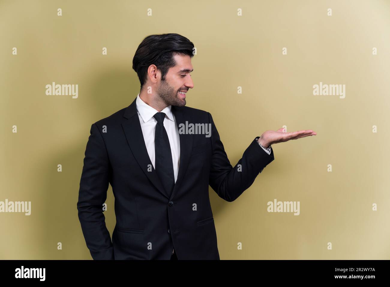 Confident businessman in formal suit making holding hand gesture to ...