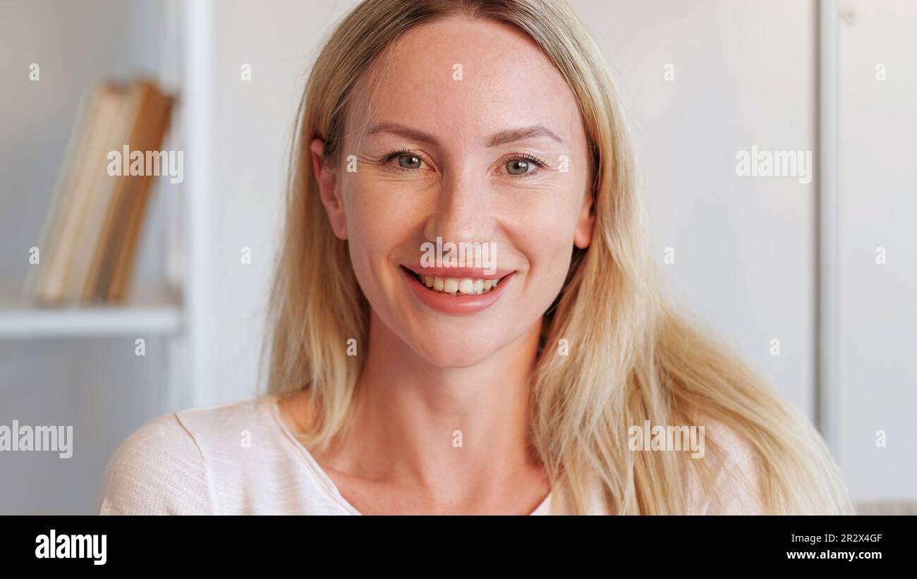 Beautiful positive blonde lady hi-res stock photography and images - Alamy