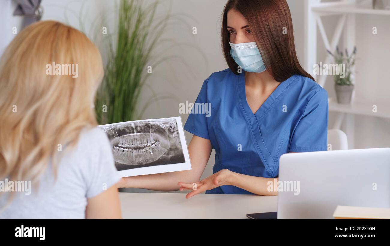 Dental radiologist teeth x-ray woman orthodontist Stock Photo - Alamy