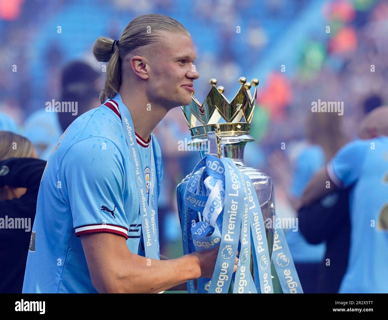 Manchester, UK. 21st May, 2023. Erling Haaland of Manchester City holds ...