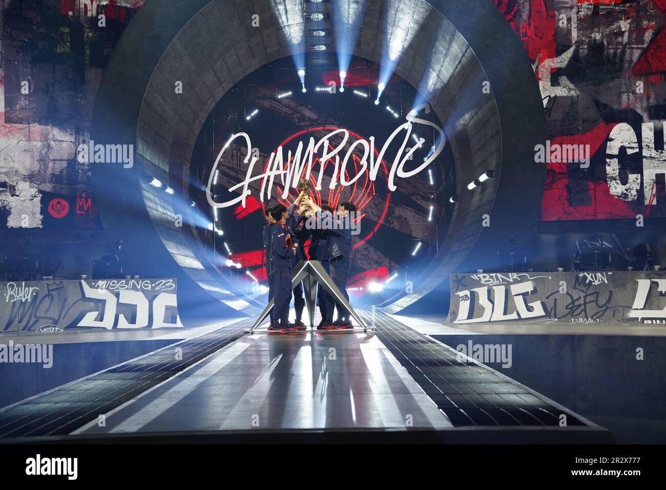 London, UK. 21st May, 2023. Team JD Gaming from China raises the trophy ...