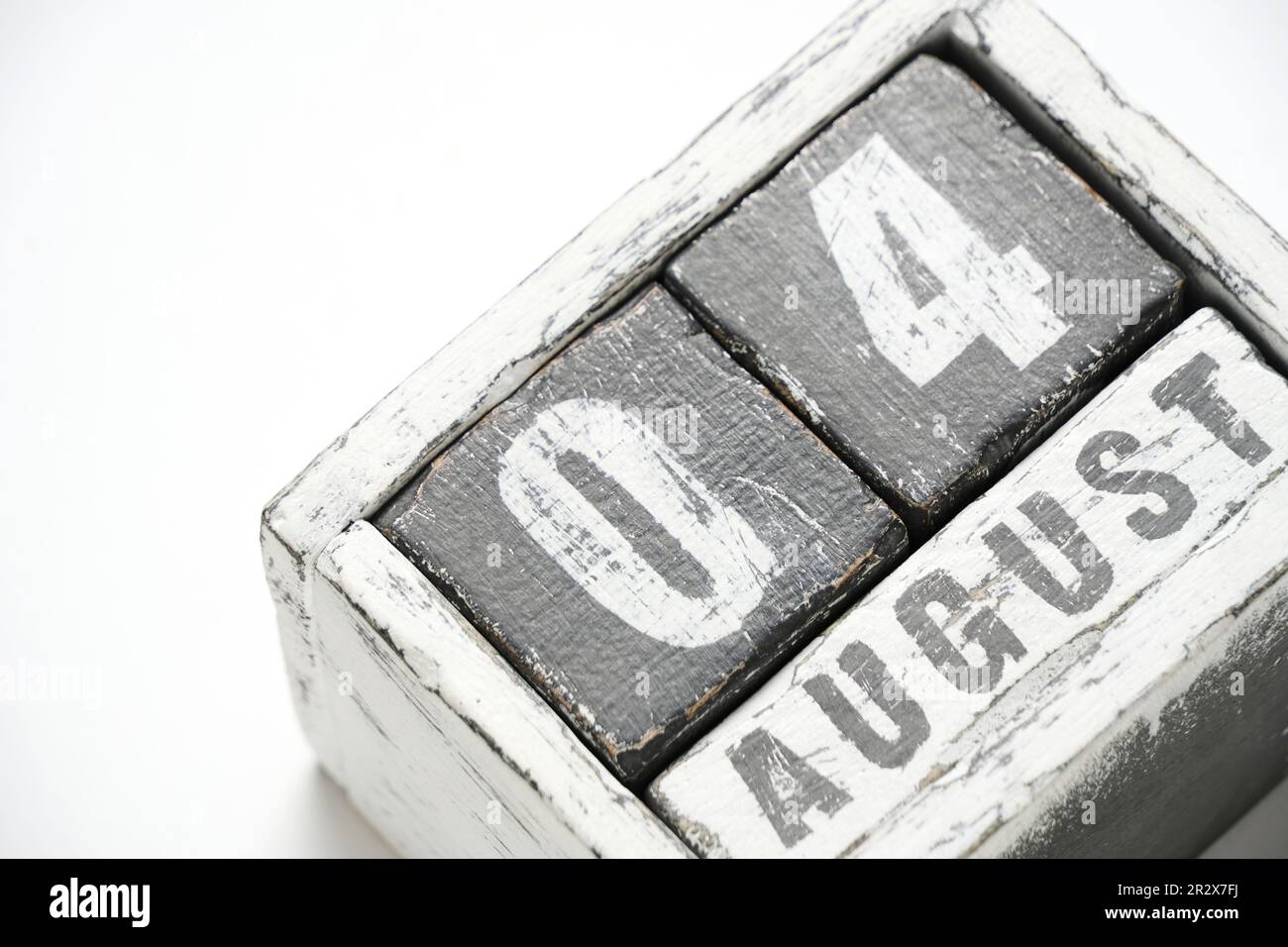 August 04, wooden calendar with cubes on a white background.U.S. Coast ...