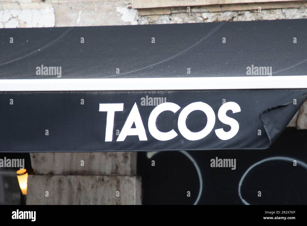 tacos text signboard on facade restaurant sign Stock Photo - Alamy