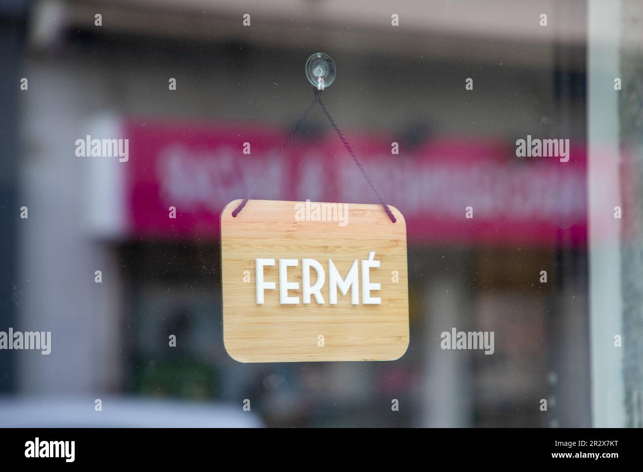 windows vintage wooden shop sign saying closed in french text ferme in ...
