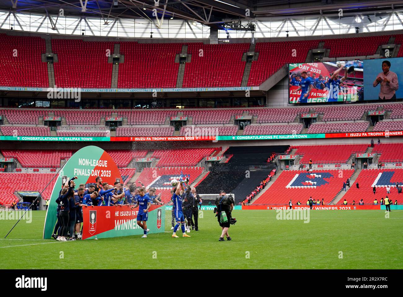 A general view as FC Halifax Town players celebrate their win by ...