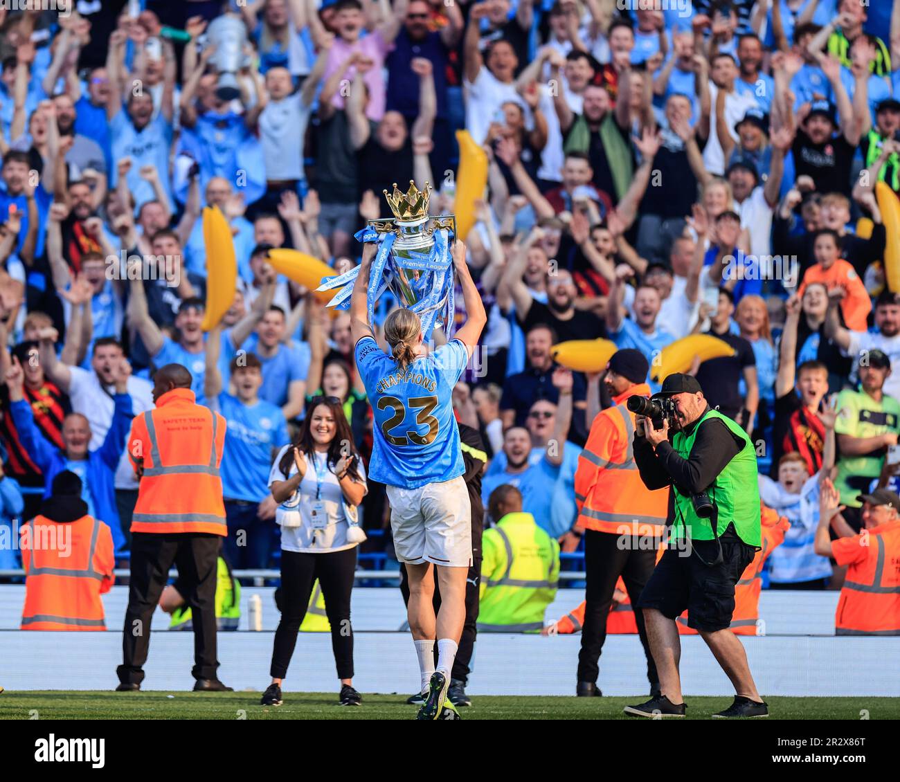 Erling Håland #9 of Manchester City lifts the Premier League Trophy and ...