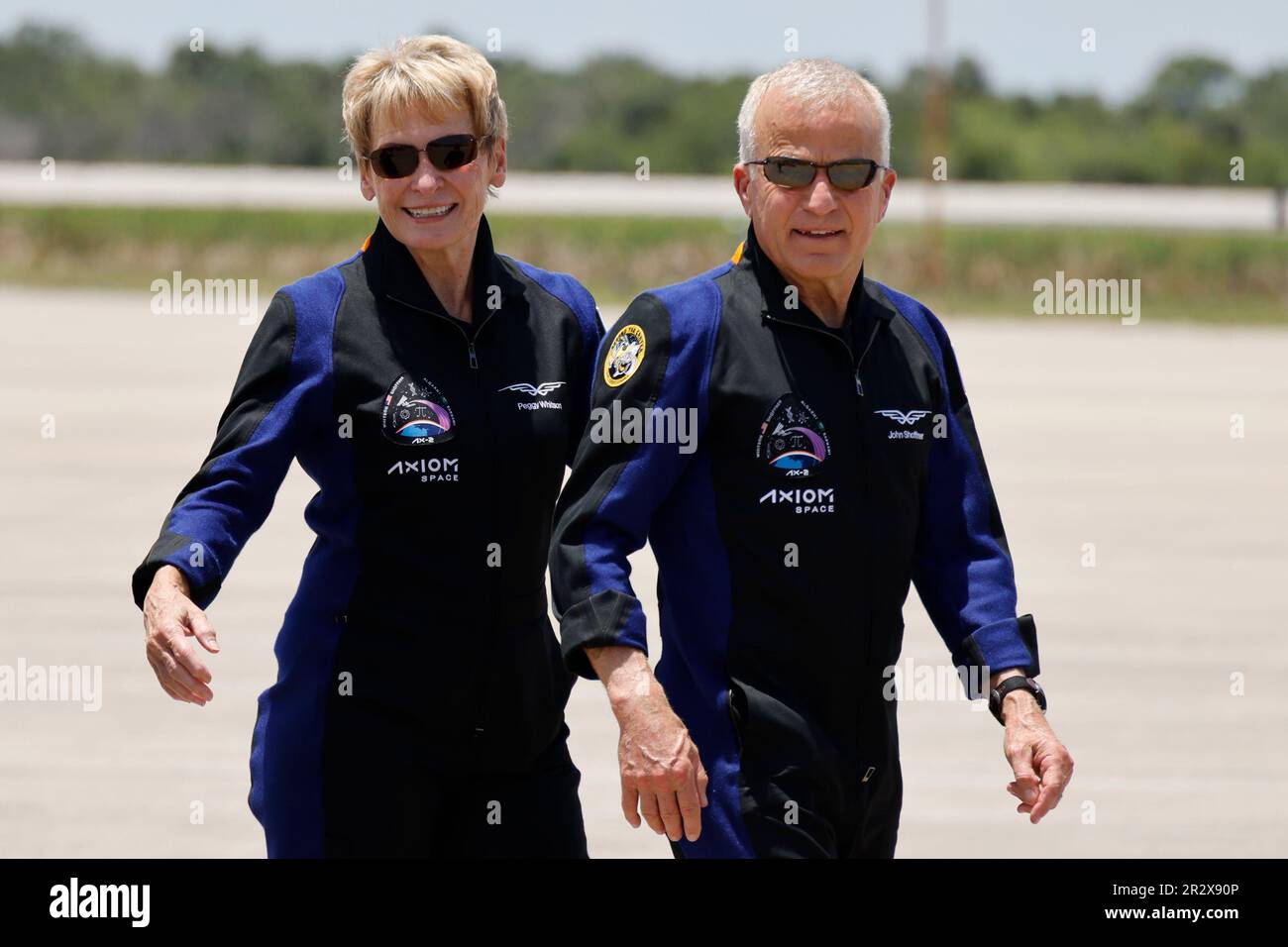 Members of the crew of the SpaceX Falcon 9 rocket, with the Crew Dragon ...