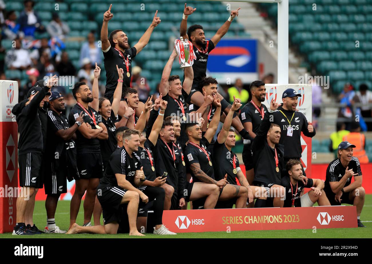 New Zealand's Sam Dickson lifts the HSBC World Series trophy with his ...
