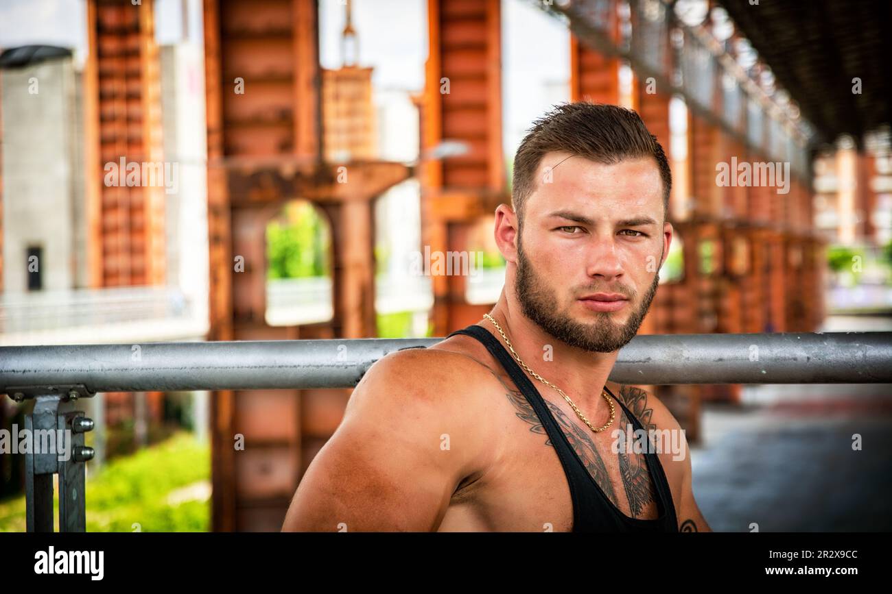 Athletic man in blue tank hi-res stock photography and images - Alamy