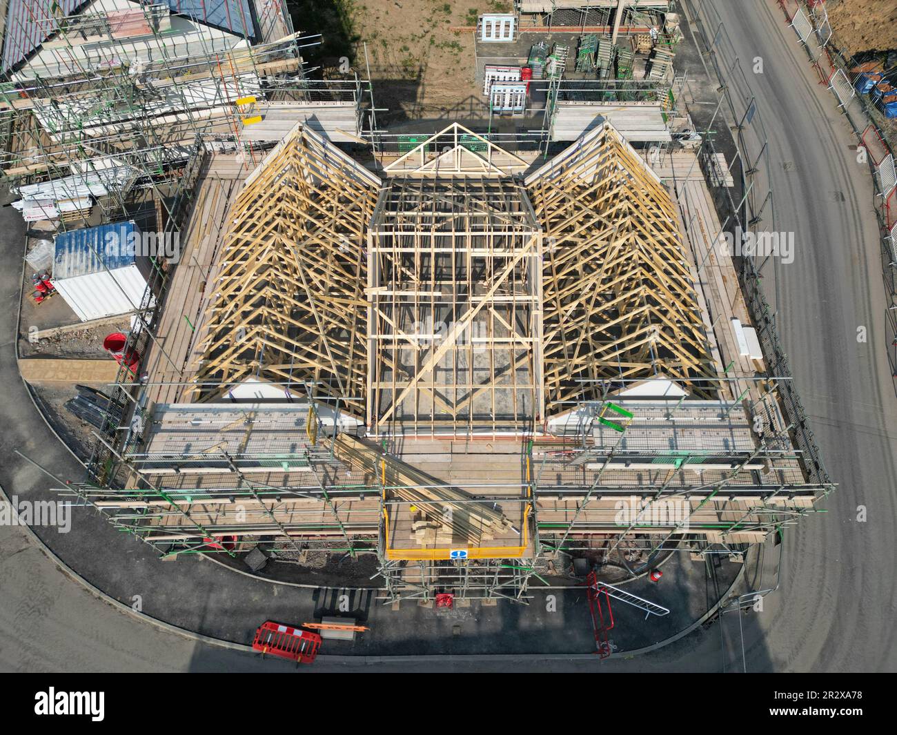 Aerial view of housing building site showing pitched roof construction ...