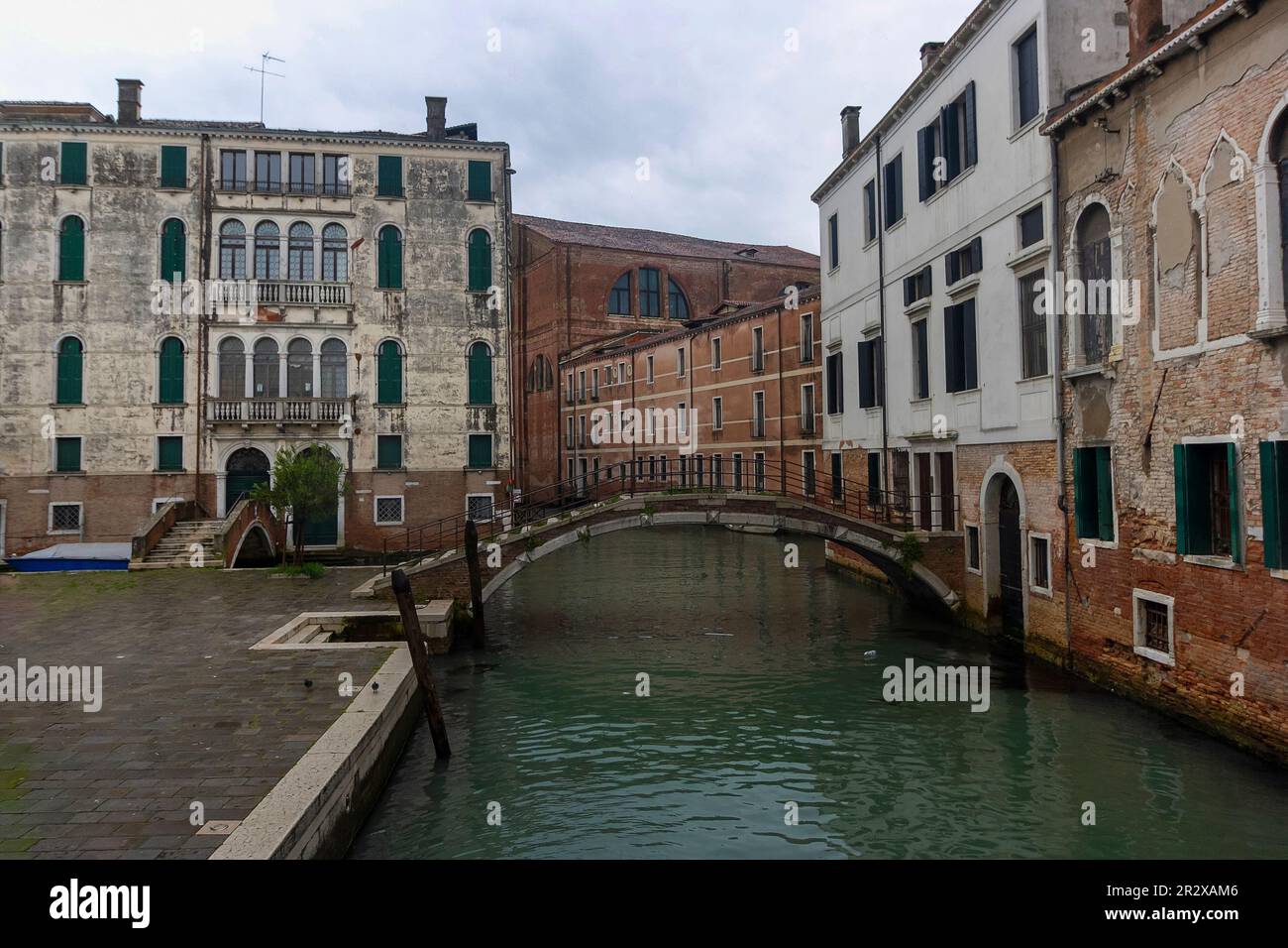 May 2023 - Venice, Italy: arched bridge over a narrow canal Stock Photo ...