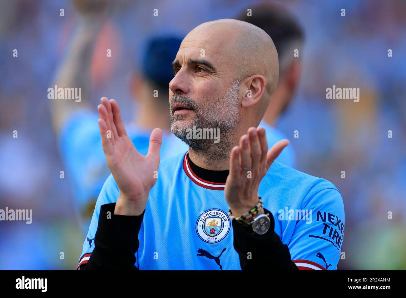 Pep Guardiola the Manchester City manager applauds his players as they ...