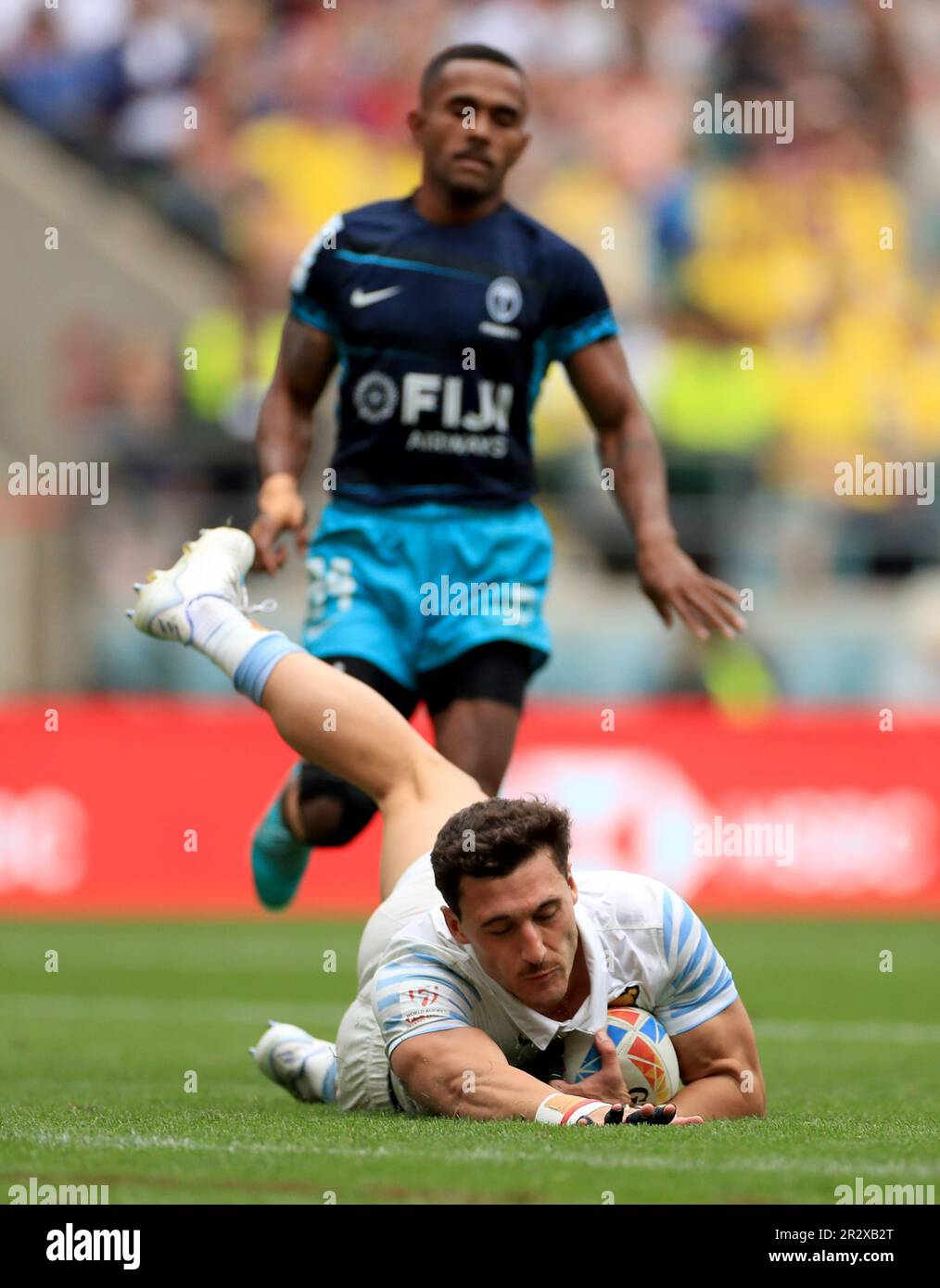Argentina's Rodrigo Isgro scores his sides third try during the Cup ...