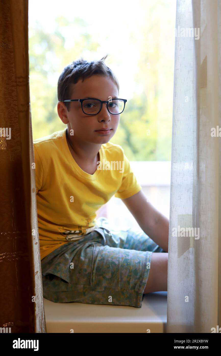 Boy window seat house hi-res stock photography and images - Alamy