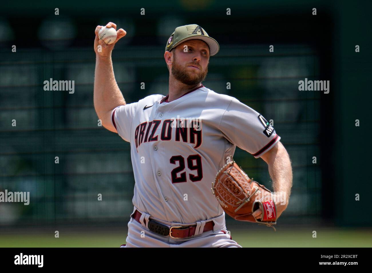 Arizona Diamondbacks starting pitcher Merrill Kelly delivers during the ...