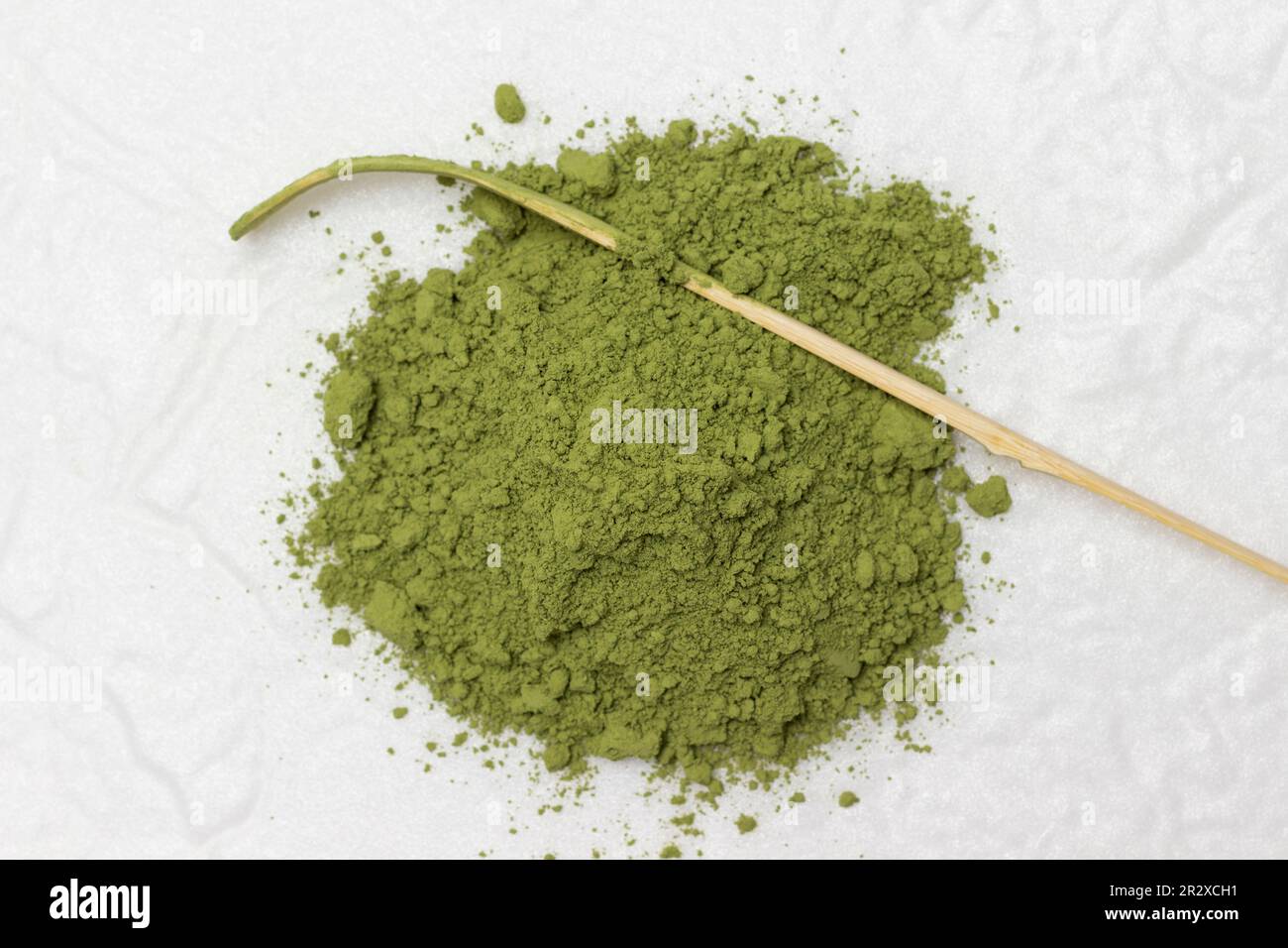 Matcha green powder and bamboo measuring spoon for making matcha green ...